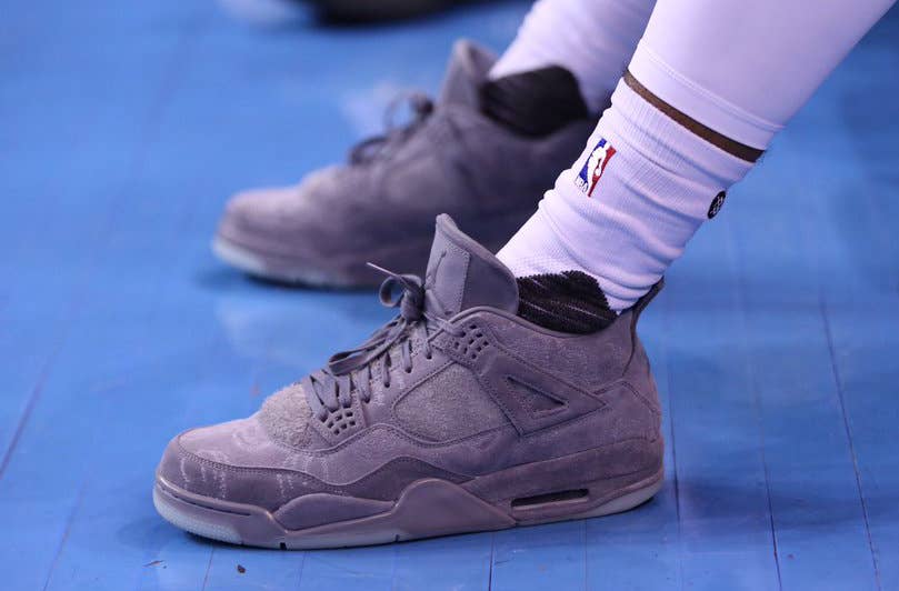Someone Actually Wore Kaws x Air Jordan 4s in an NBA Game | Complex