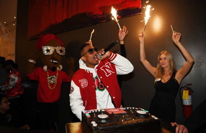 Nick Cannon Isn't Down With Travis Scott Joining Maroon 5 at Super Bowl ...