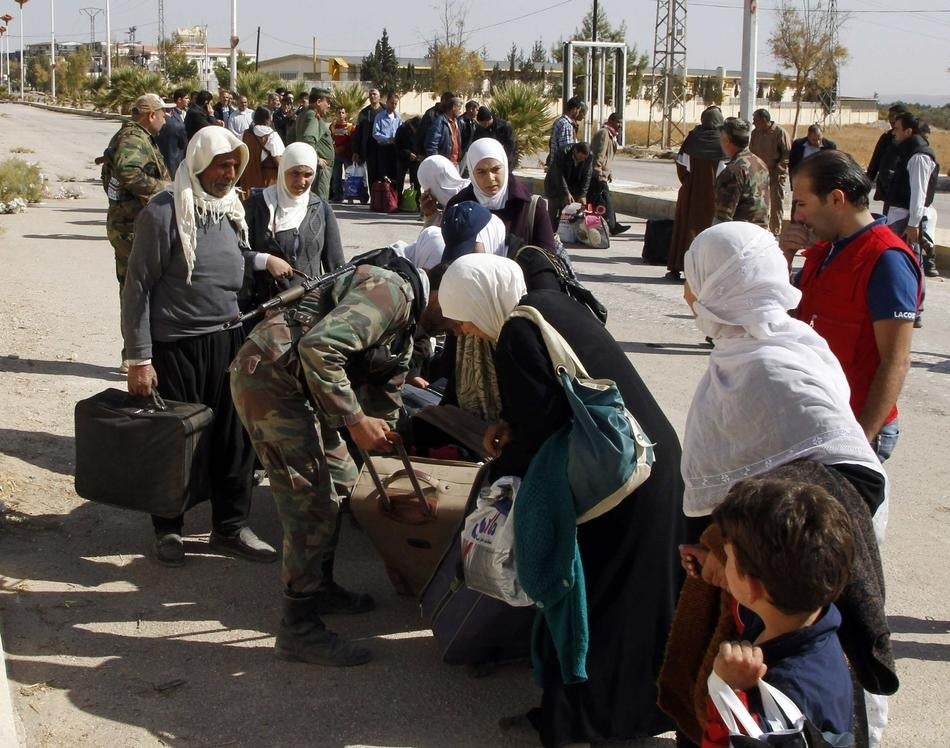 Thousands Of Starving Syrians Flee A Damascus Town That Was Cut Off ...