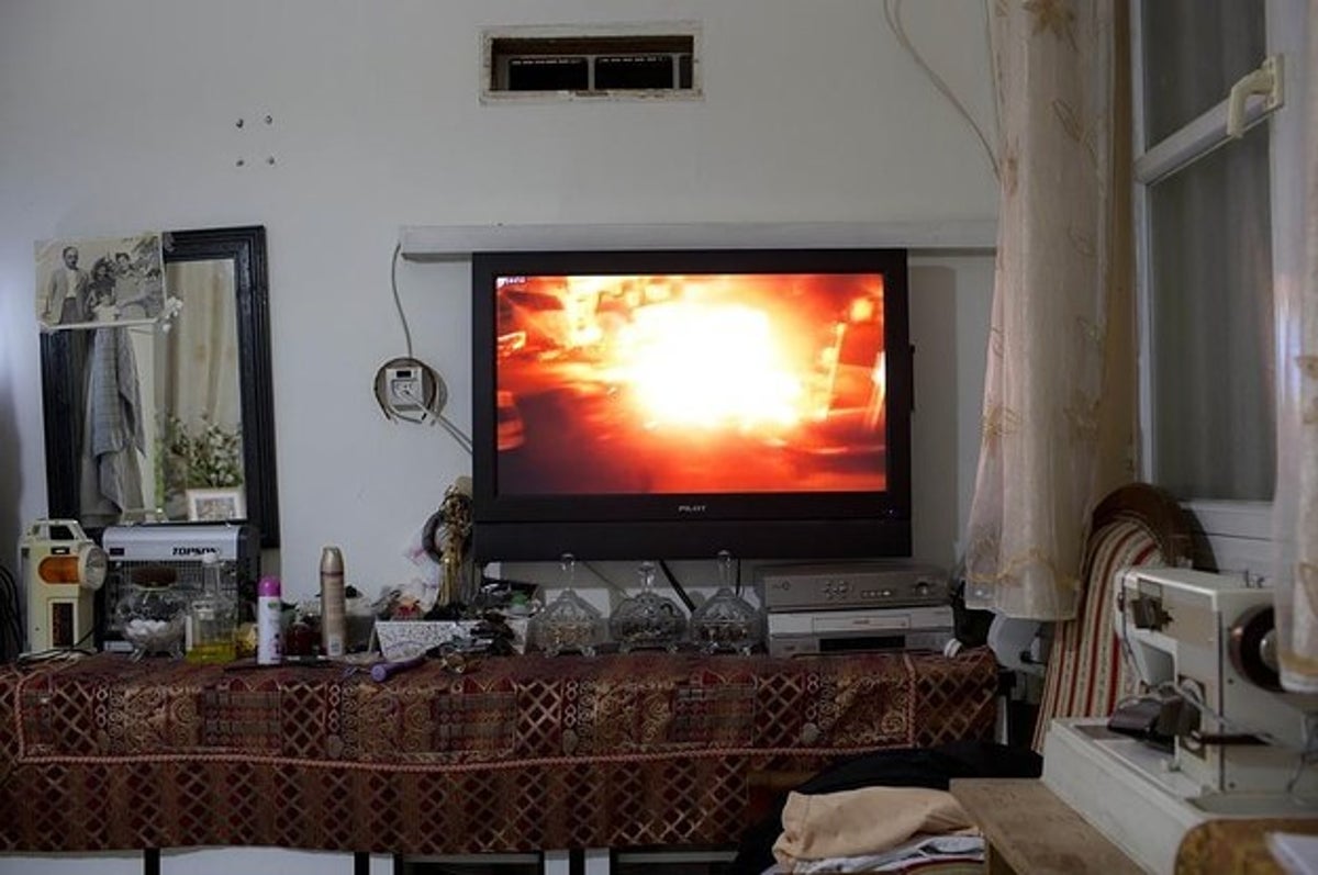 These Pictures Show TVs Across Israel Tuned Into The Gaza War