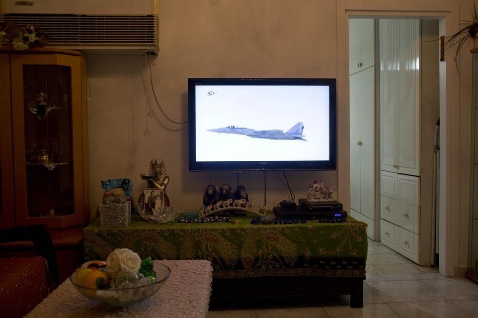 These Pictures Show TVs Across Israel Tuned Into The Gaza War
