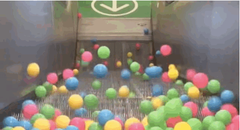 These Balls On An Escalator Are Absolutely Mesmerizing
