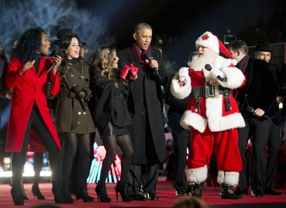 8 Hilarious Photos Of Obama Being Delightfully Dorky With Santa Claus