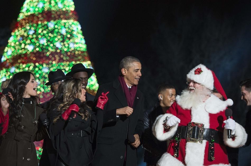 8 Hilarious Photos Of Obama Being Delightfully Dorky With Santa Claus