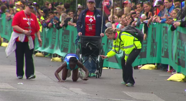 Determined Marathon Runner Crawls Over The Finish Line After Her Body ...