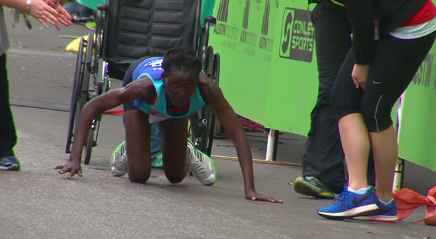 Determined Marathon Runner Crawls Over The Finish Line After Her Body ...