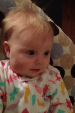 A Baby Learns About Static Electricity In The Cutest Way Possible