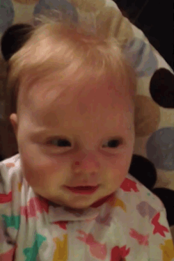 A Baby Learns About Static Electricity In The Cutest Way Possible