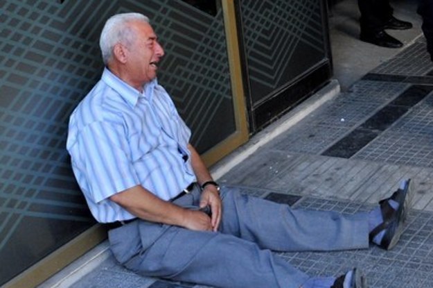 Heartbreaking Photos Show A Greek Man Crying Over His Country Outside A ...