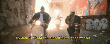 Macklemore's New Moped-Centric Music Video Is Goofy As Hell