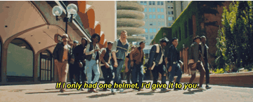 Macklemore's New Moped-Centric Music Video Is Goofy As Hell