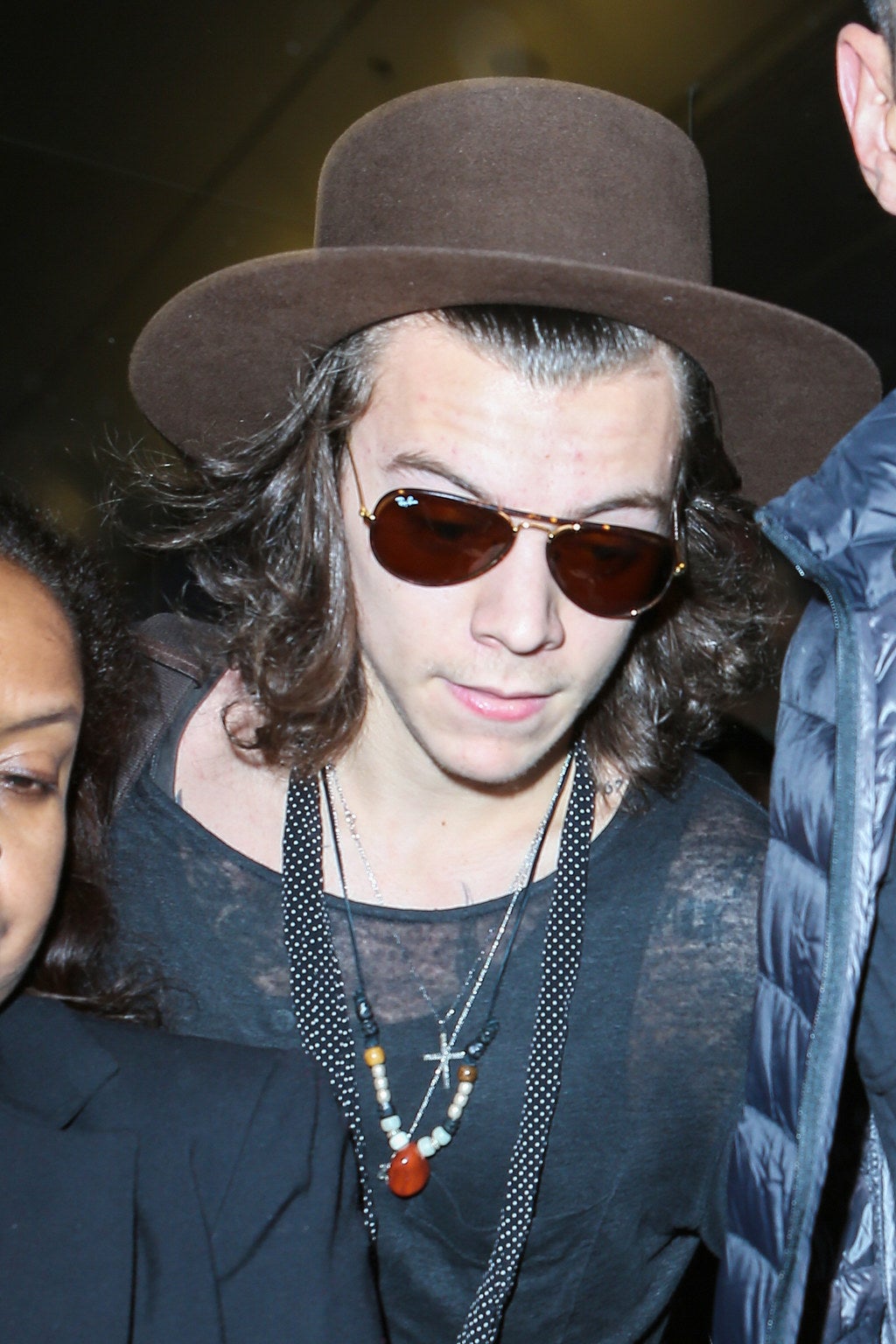 A Look At Approximately How Many Inches Harry Styles' Hair Grew In 2015