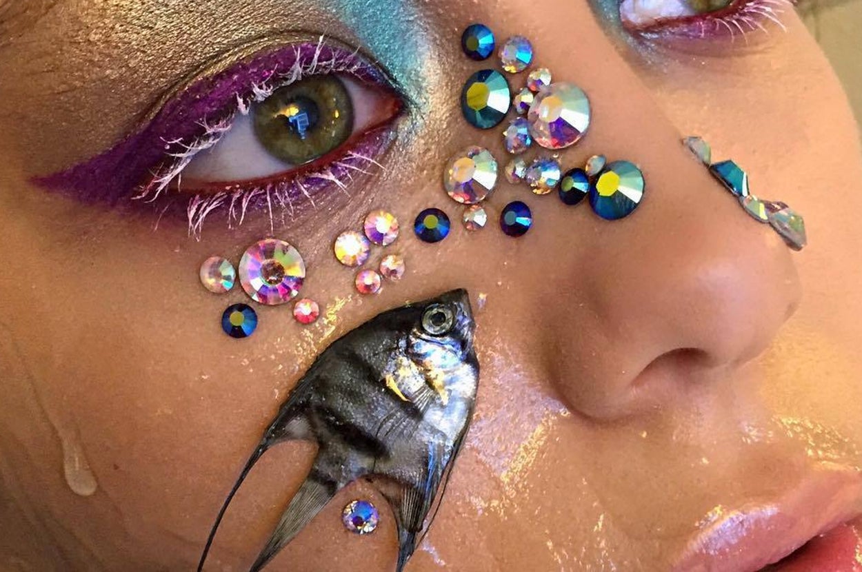 This Woman Is Using Dead Fish As A Makeup Accessory