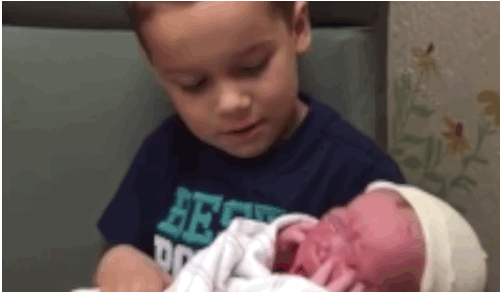 This Kid Holding His Baby Brother Is All Of Us With Children