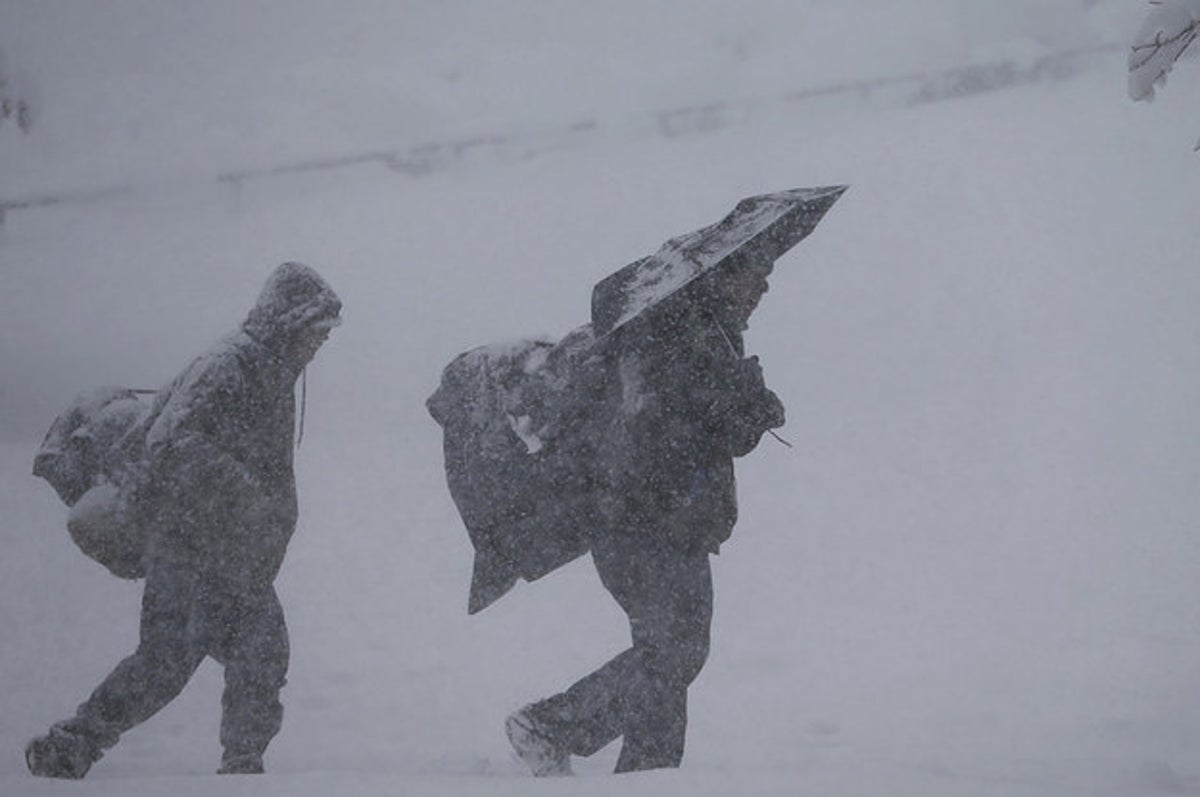 Powerful Spring Blizzard Shuts Down Denver Airport, Stranding Travelers