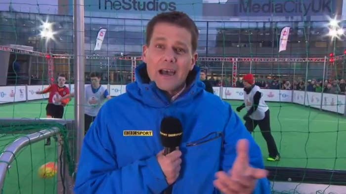 Look At This Sports Reporter Getting Clouted On The Head By A Football