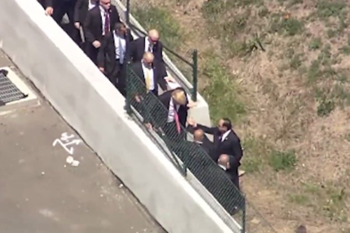 Trump Forced To Jump Barricade As Protesters Storm California Event