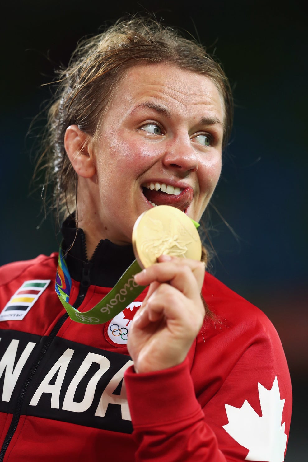 Here Is Adorable Badass Erica Wiebe Carrying Her Coach After She Won Gold