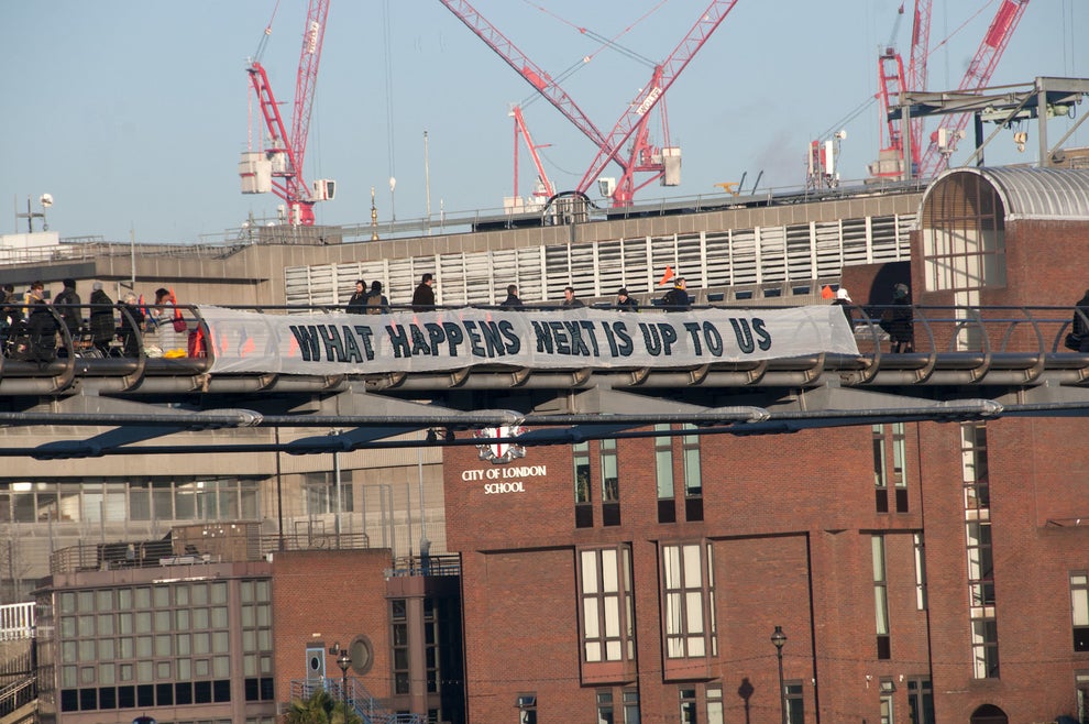 More Than 150 Trump Protest Banners Are Being Dropped Over Bridges ...