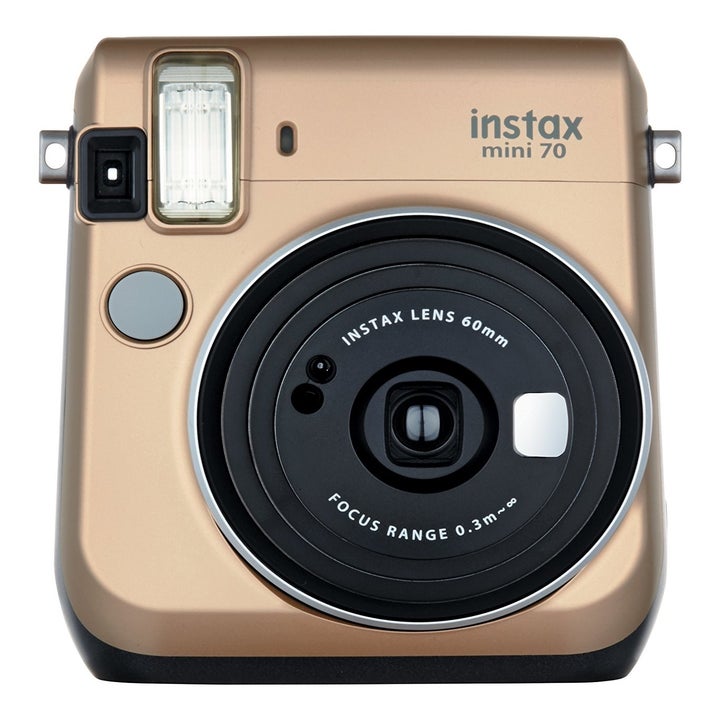 Here's Why You Should Start Traveling With An Instant Camera
