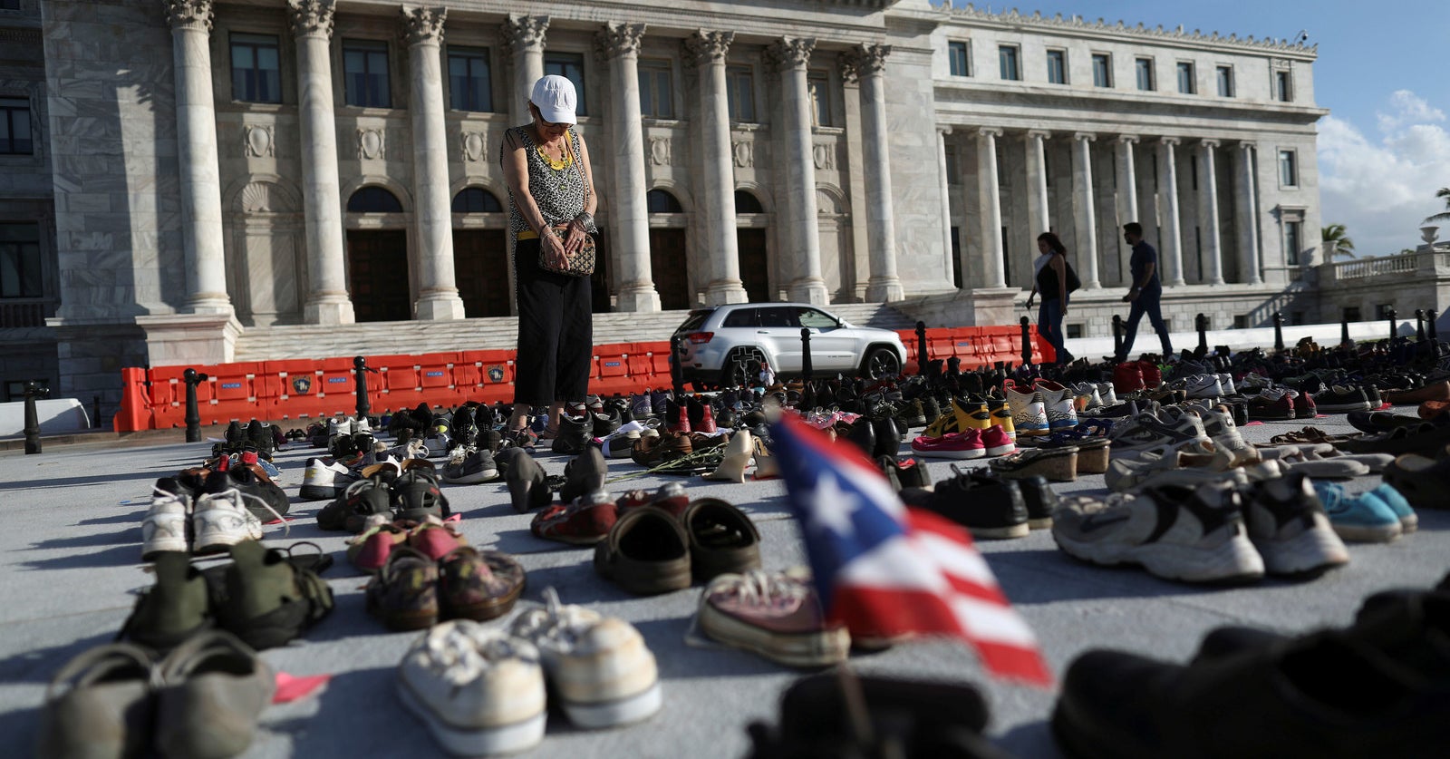 These Moving Photos Show Empty Pairs Of Shoes Marking The Dead In ...