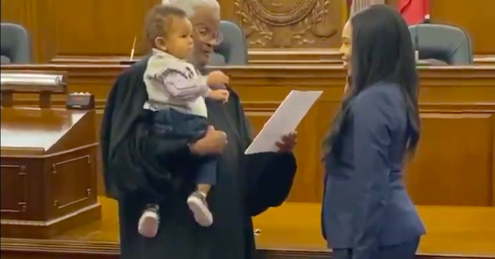 This Adorable Video Shows A Judge Holding A New Lawyer's Baby