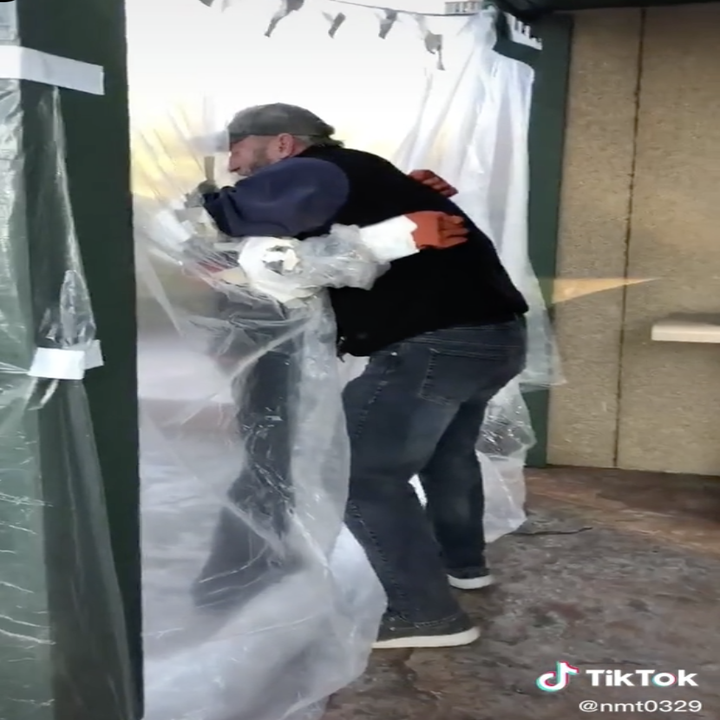 Family Creates Shield To Hug After Uncle's COVID Death