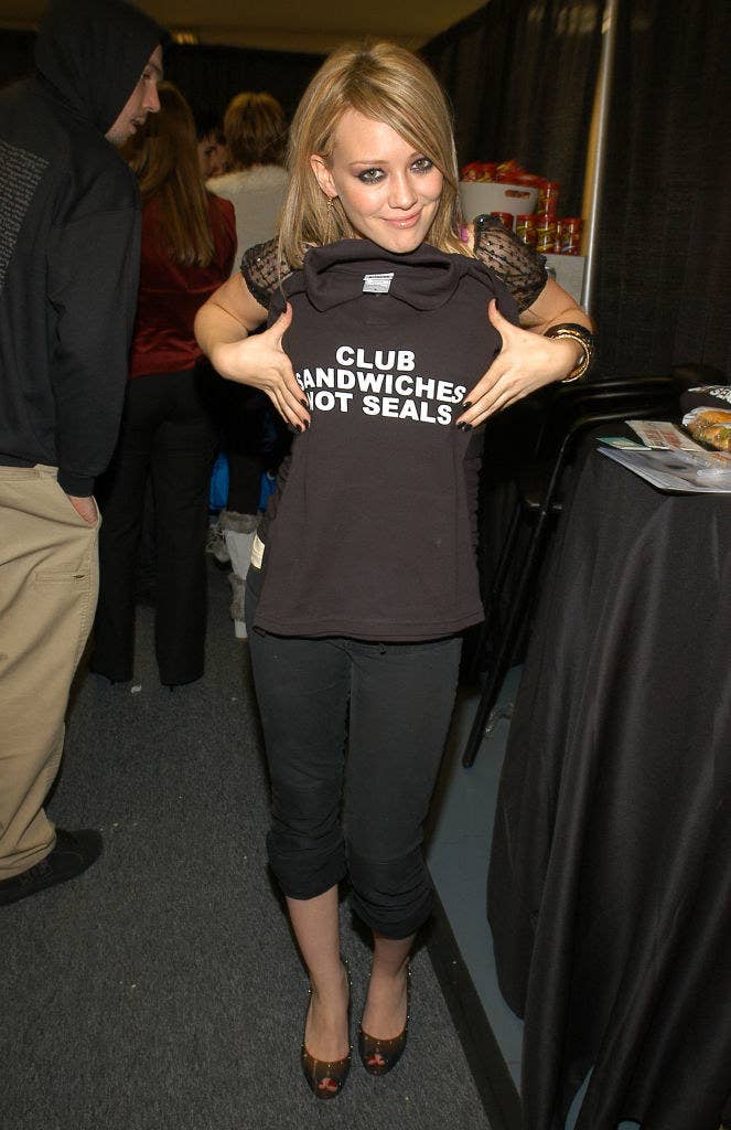 hilary duff posing with things