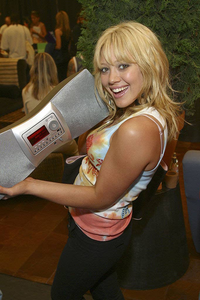 hilary duff posing with things