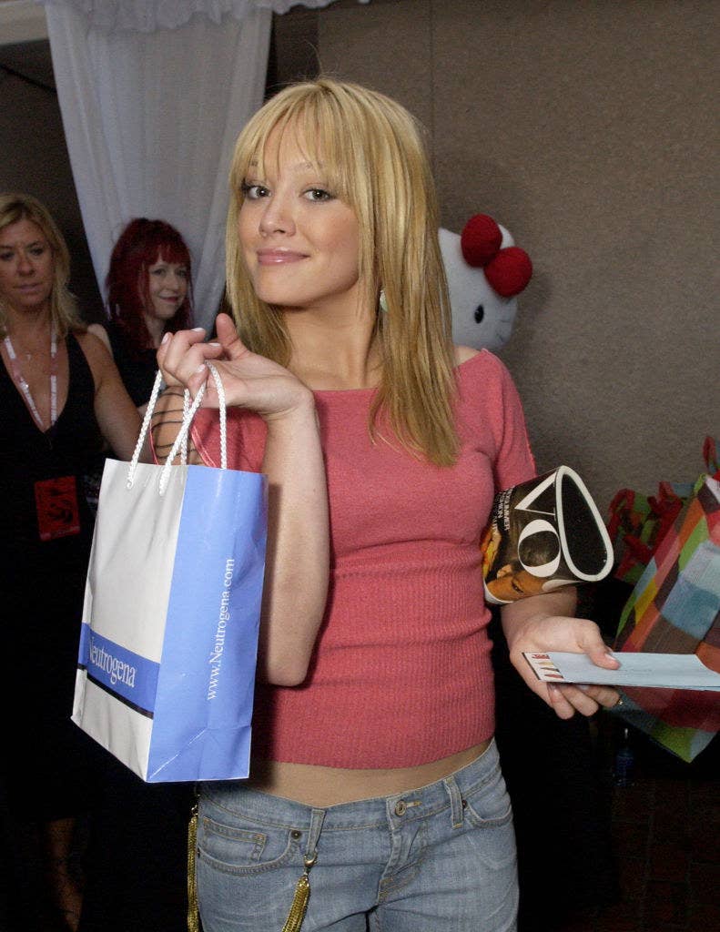 hilary duff posing with things