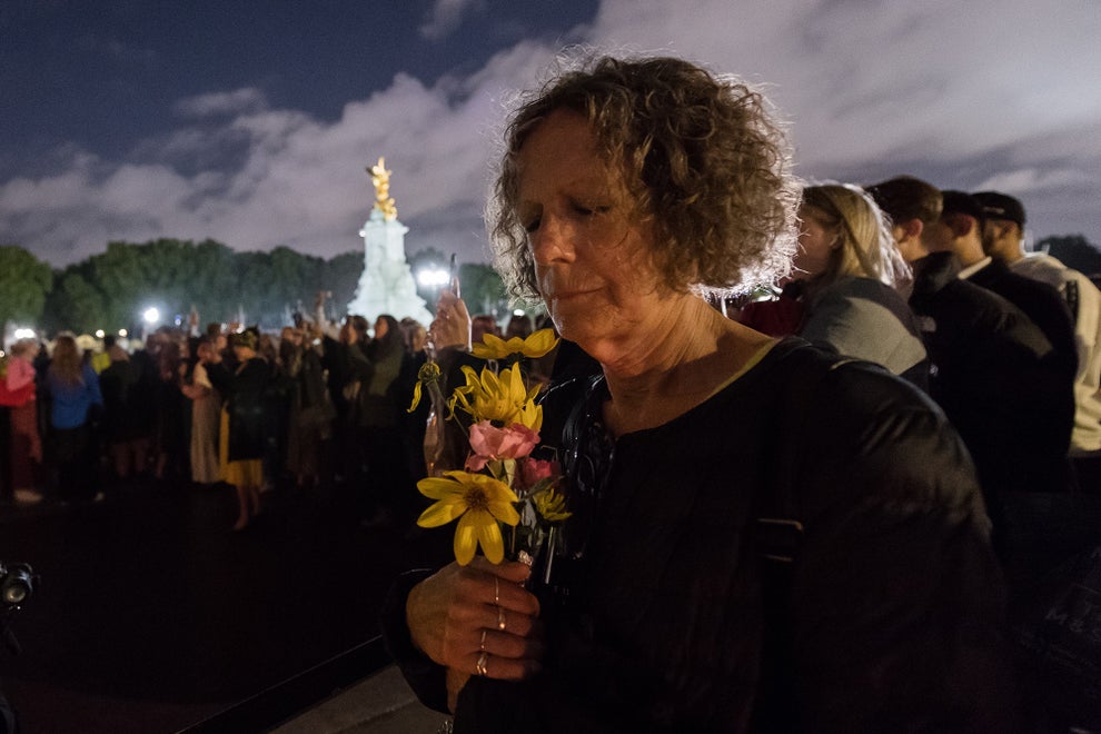 People Mourn Queen Elizabeth II Outside Buckingham Palace