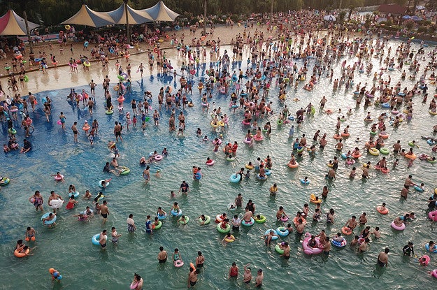 Thousands Gather for Pool Party in Wuhan, China, Where COVID-19 First ...