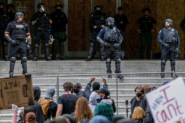 Video Shows Officer Telling Armed White Men How to Avoid Arrest During ...