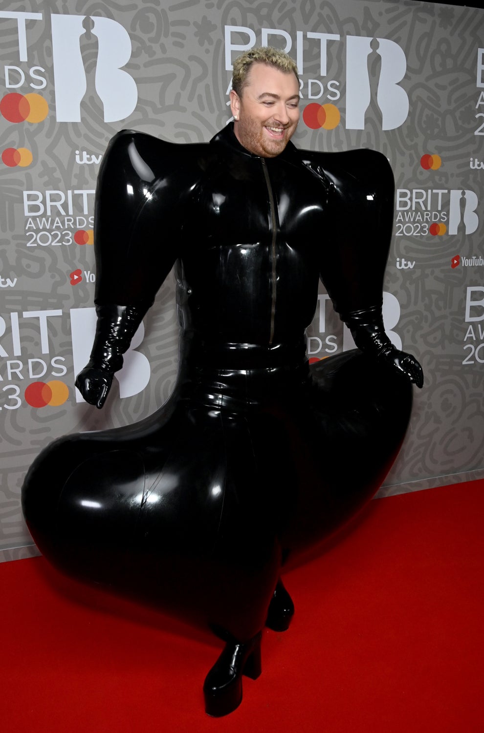 Sam Smith Wears Inflatable BRIT Awards Red Carpet Look