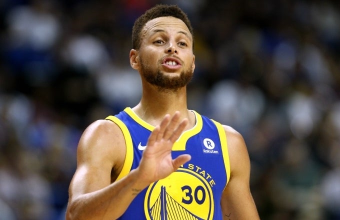 Steph Curry Takes Swatted Shot by Lauri Markkanen Off the Face | Complex