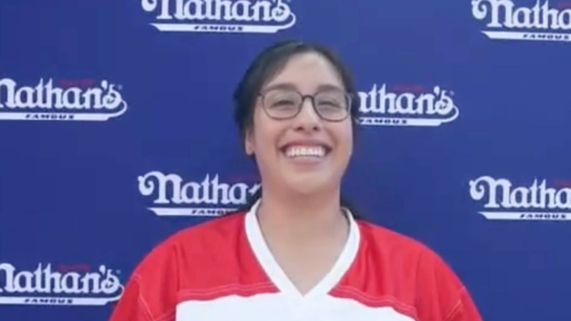 'Glizzy Lizzy' Steals the Show at Nathan's Hot Dog Eating Contest | Complex