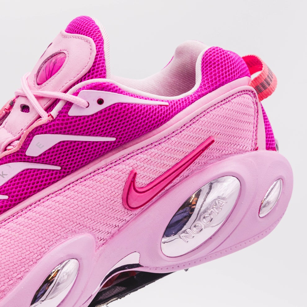 Drake Wears Pink Nike NOCTA Glide Sneakers by the Surgeon | Complex