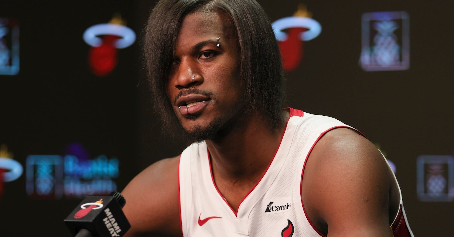 Jimmy Butler Rocks Emo Look With Straightened Hair and Piercings | Complex