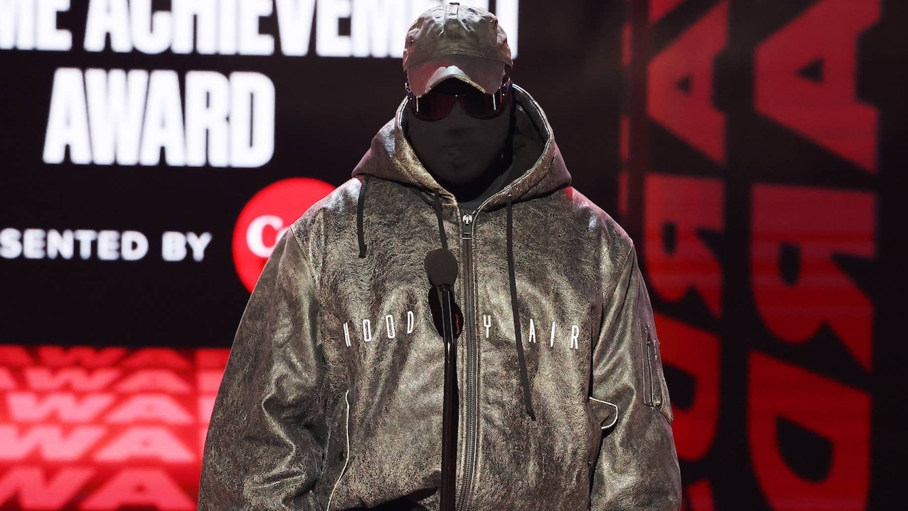 Kanye West Wears Alexander McQueen Dante Mask to Super Bowl | Complex