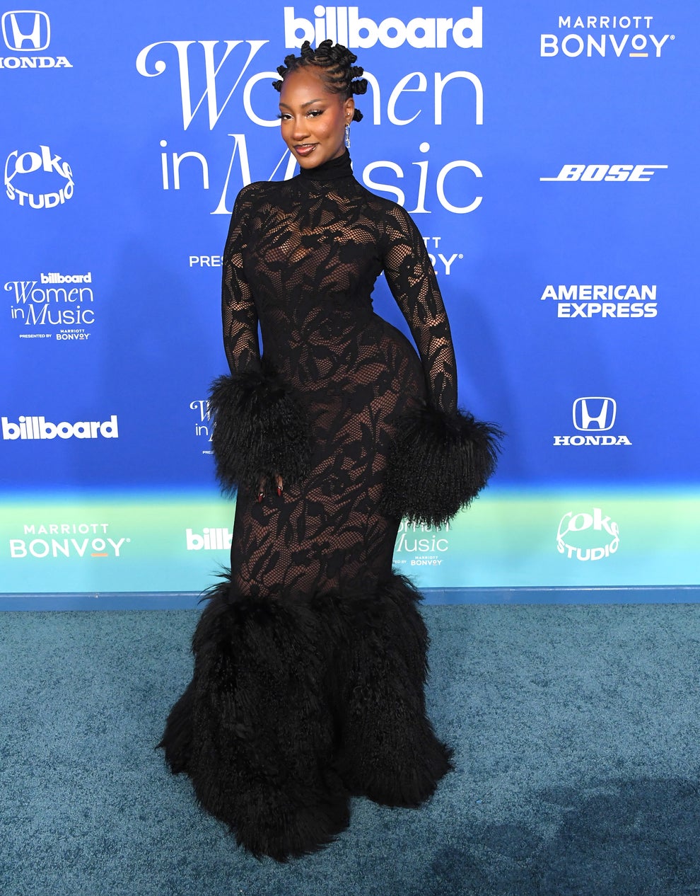 Tems Stuns Photographer on Red Carpet With Backside | Complex