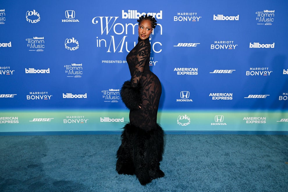 Tems Stuns Photographer on Red Carpet With Backside | Complex
