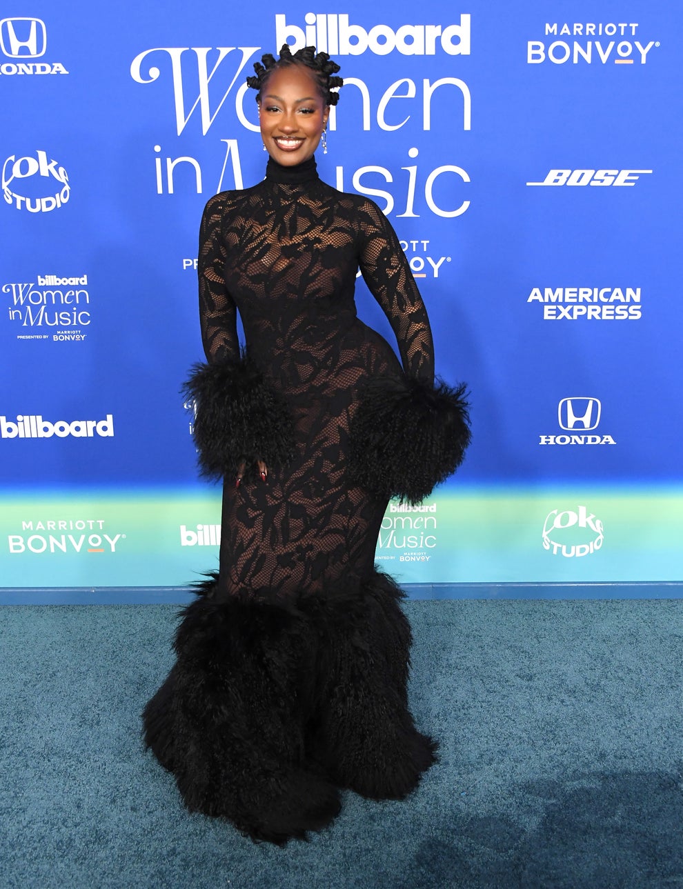 Tems Stuns Photographer on Red Carpet With Backside | Complex