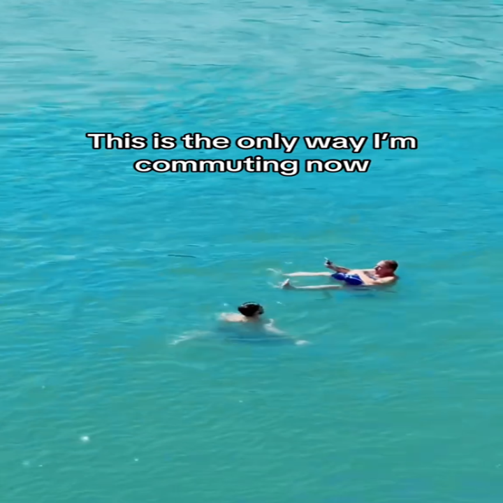 People Take Floating River Commute In Switzerland