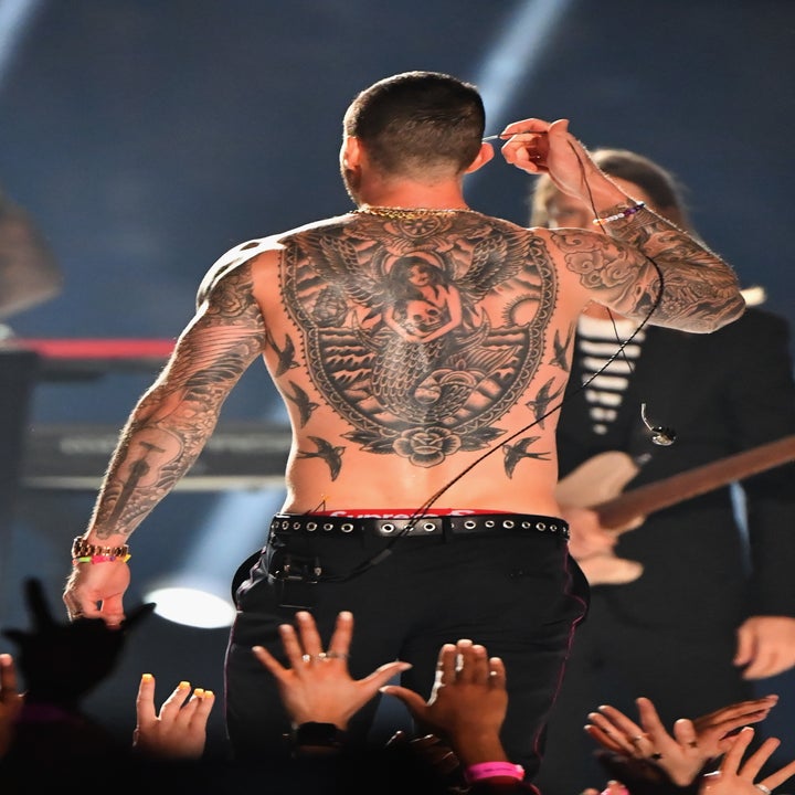19 Celebrities With Massive Back Tattoos