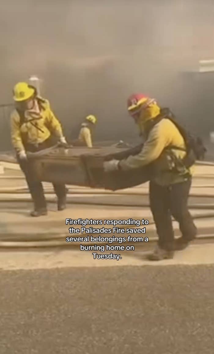 firefighter saving someone from fire
