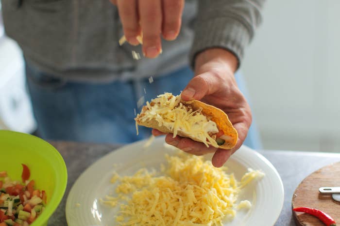 Wash Your Pre-Shredded Cheese For More Even Melting