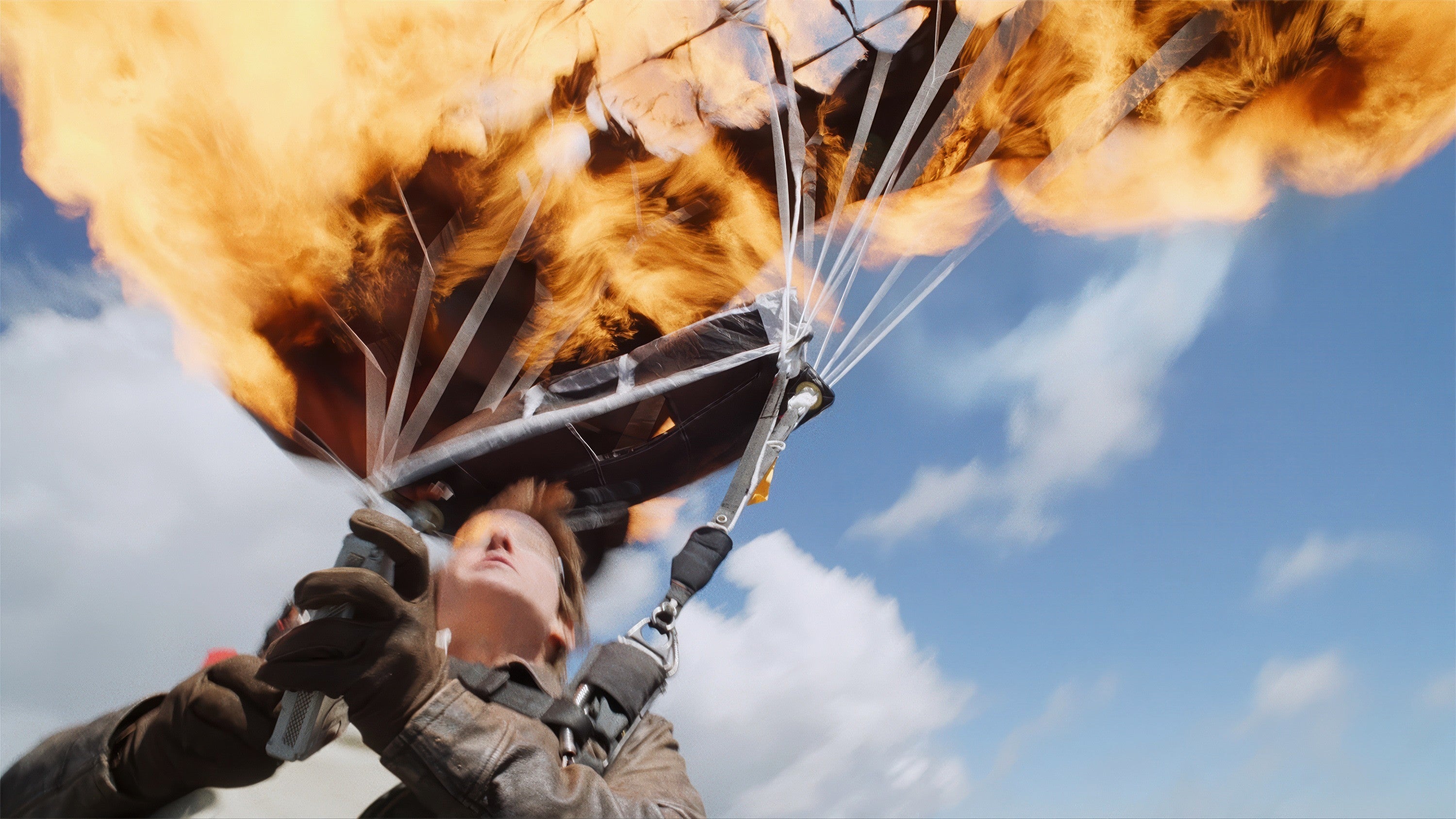 Tom Cruise Does 16 Burning Parachute Jumps
