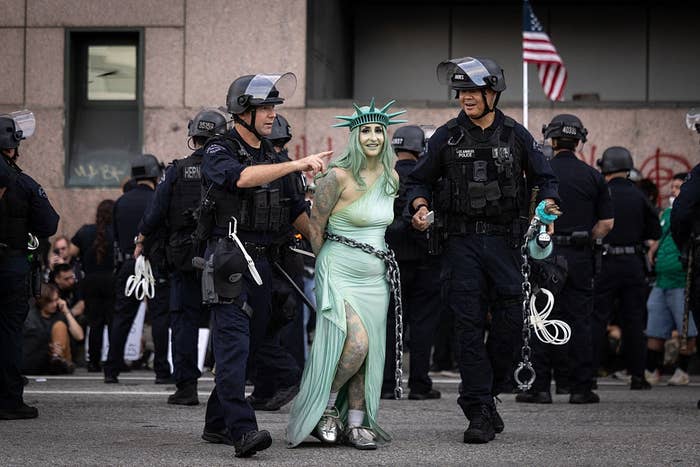 Statue Of Liberty Protester Goes Viral Online, No Kings