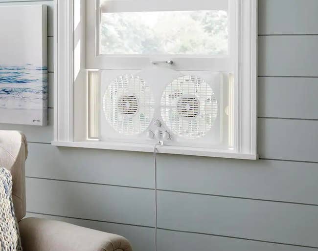 13 Best Window Fans For Keeping Things Nice And Breezy