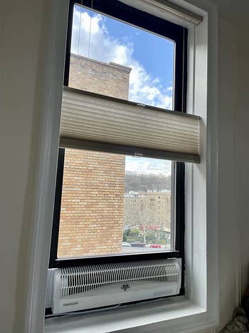 13 Best Window Fans For Keeping Things Nice And Breezy